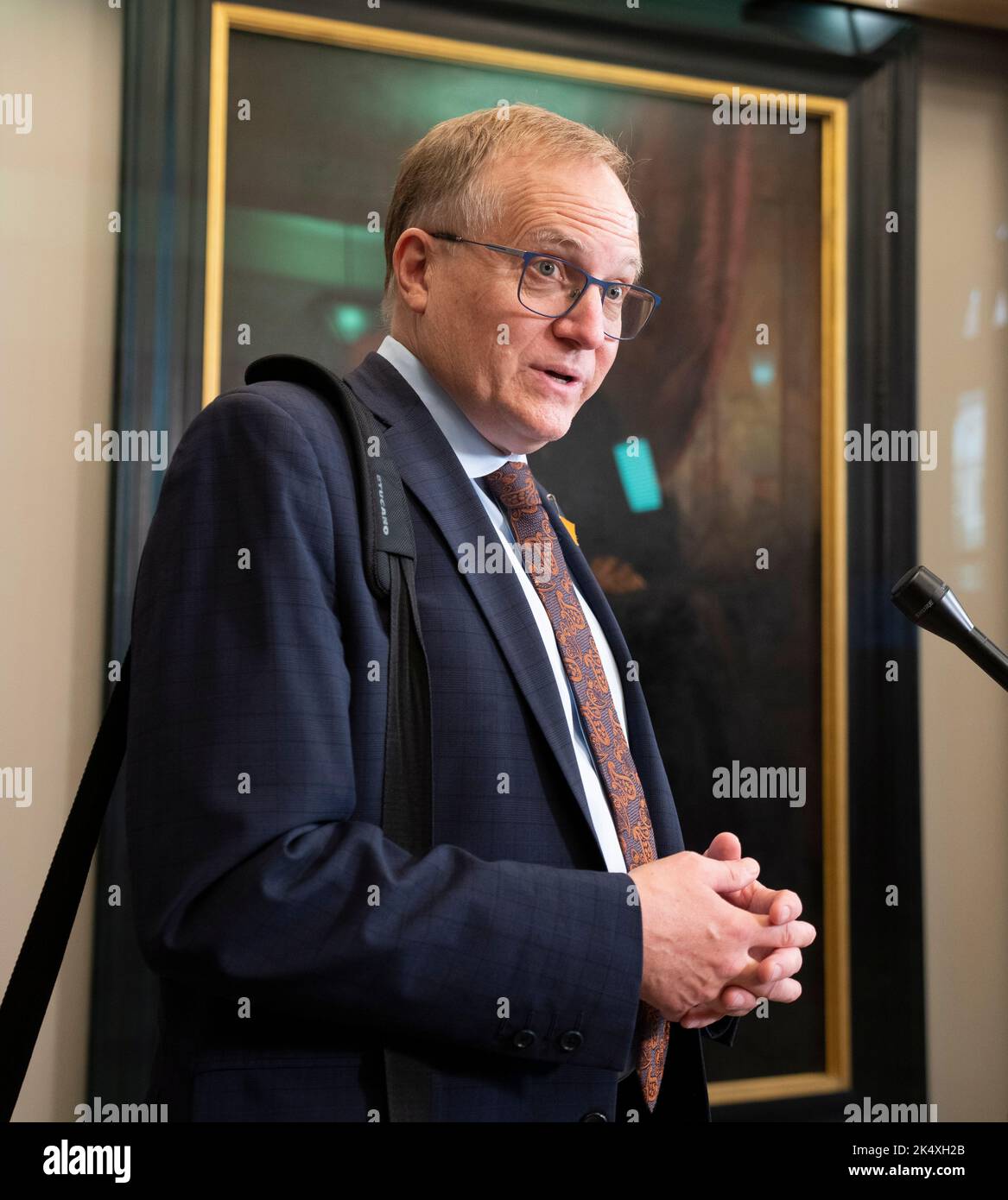 NDP MP for New Westminster-Burnaby Peter Julian speaks with reporters ...
