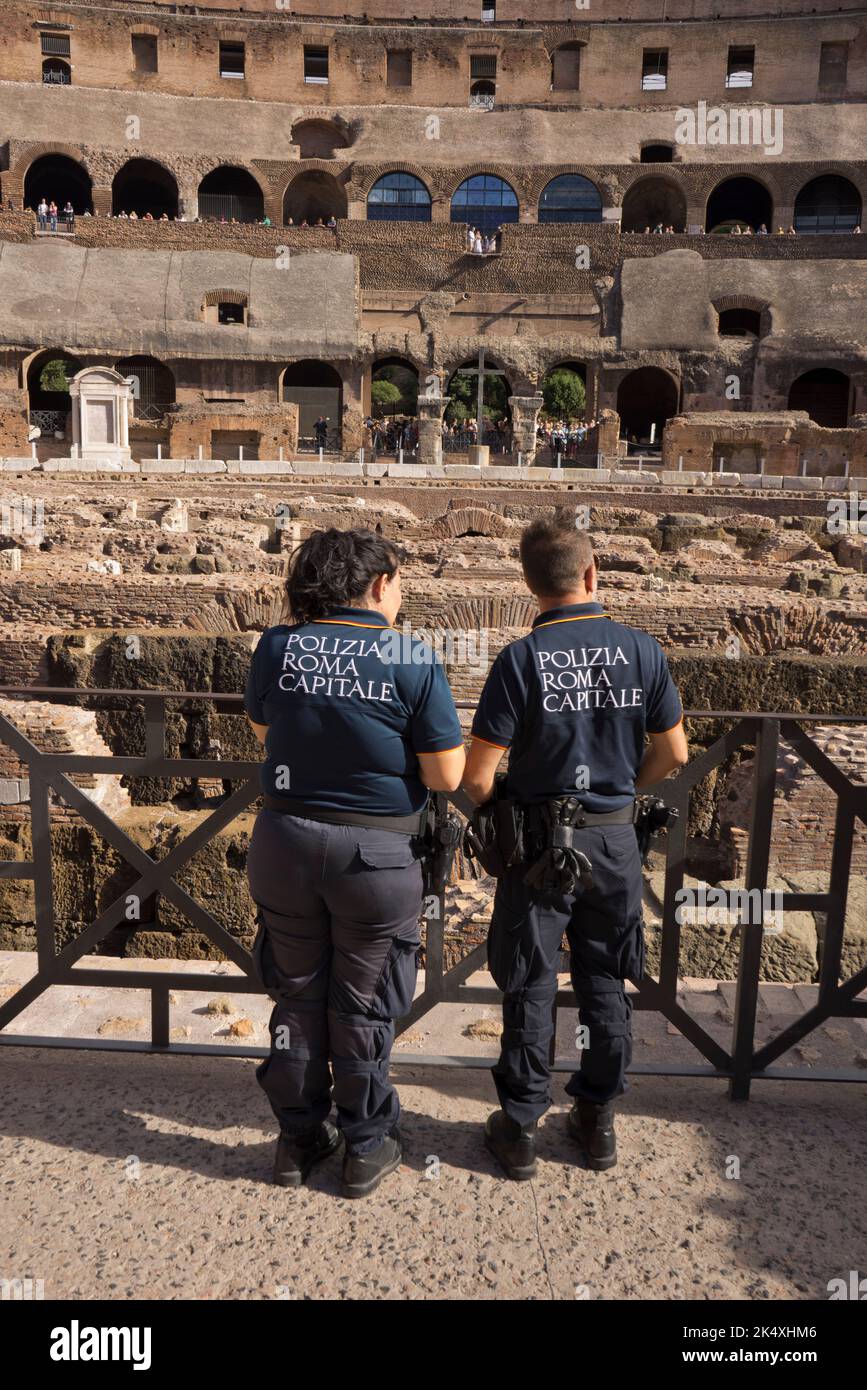 View of police and visitors at the ancient Roman Colisseum arena; Rome ...