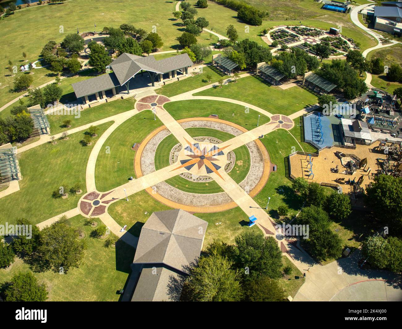 The aerial view of trees and buildings of the Frisco Commons Park Stock ...