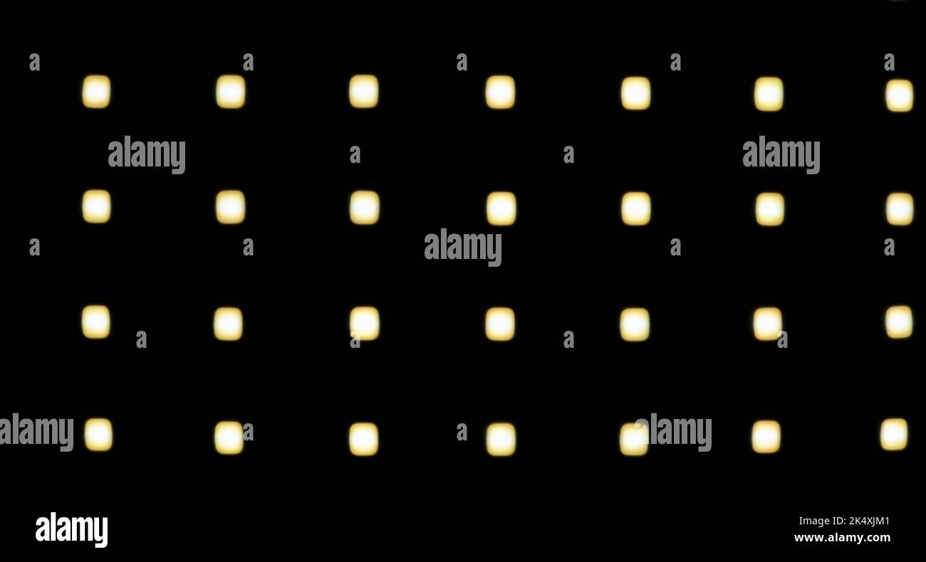 Abstract image of square light dots on dark black background Stock ...