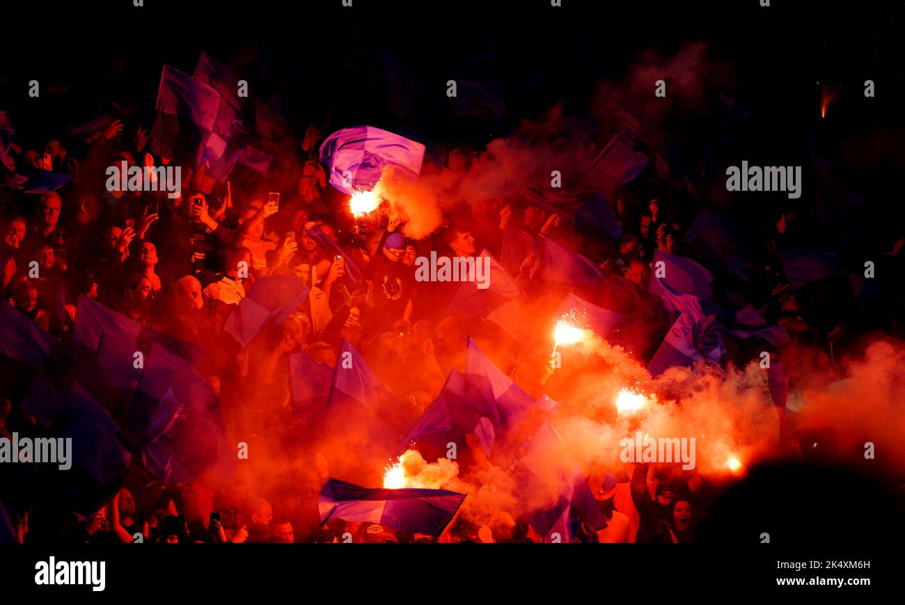 Fans let off flares in the stands during the UEFA Champions League ...