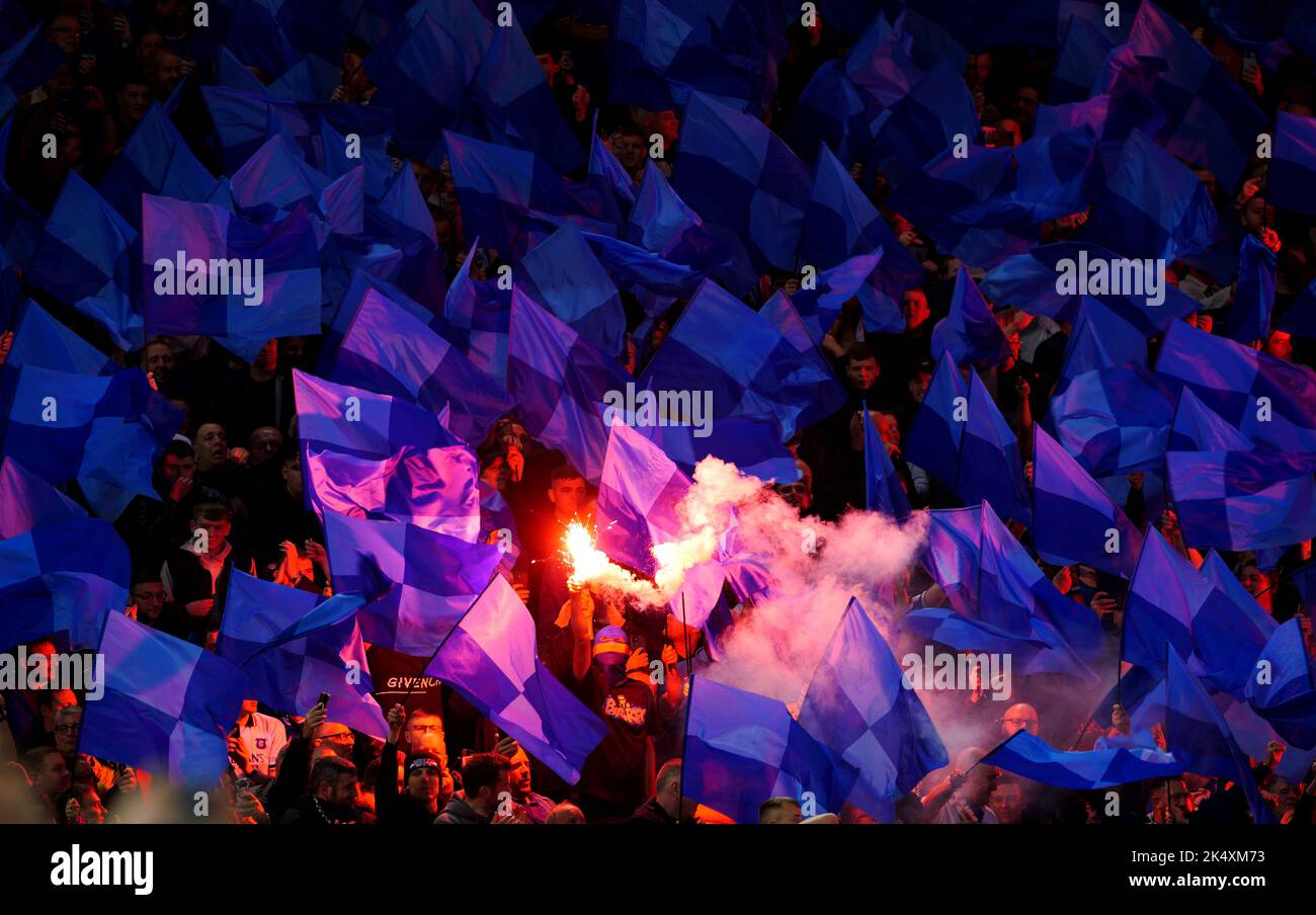 Fans let off flares in the stands during the UEFA Champions League ...