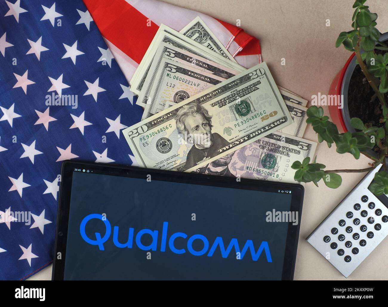 In this photo illustration, Qualcomm Inc. logo seen displayed on a ...