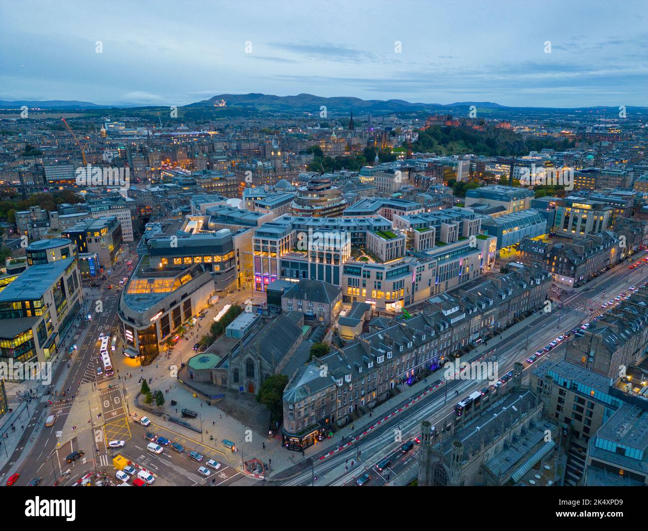 Aerial view at dusk of St James Quarter and skyline of Edinburgh ...