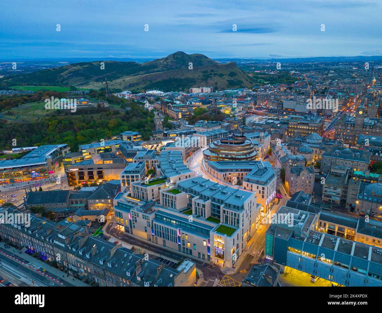 Aerial view at dusk of St James Quarter and skyline of Edinburgh ...