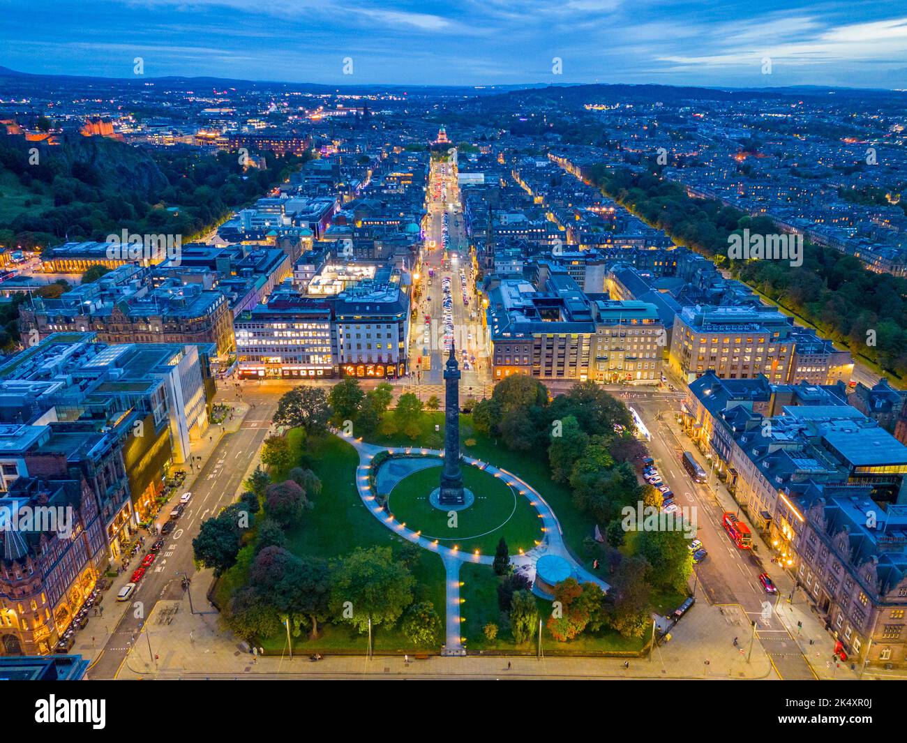 Aerial view at dusk of St Andrew Square and skyline of Edinburgh ...