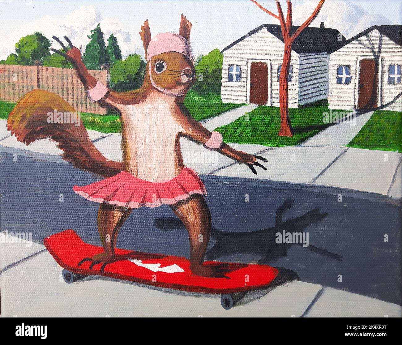 A female red squirrel uses a skateboard to zoom her way through a ...