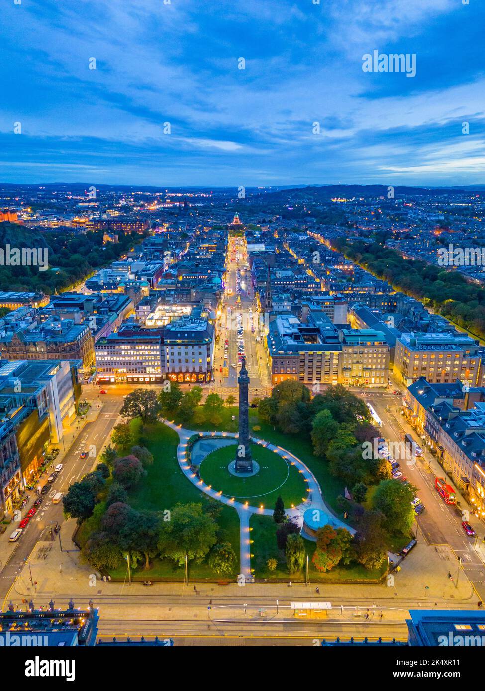 Aerial view at dusk of St Andrew Square and skyline of Edinburgh ...