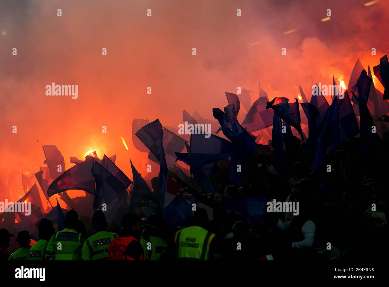 Fans set off flares in the stands ahead of the UEFA Champions League ...