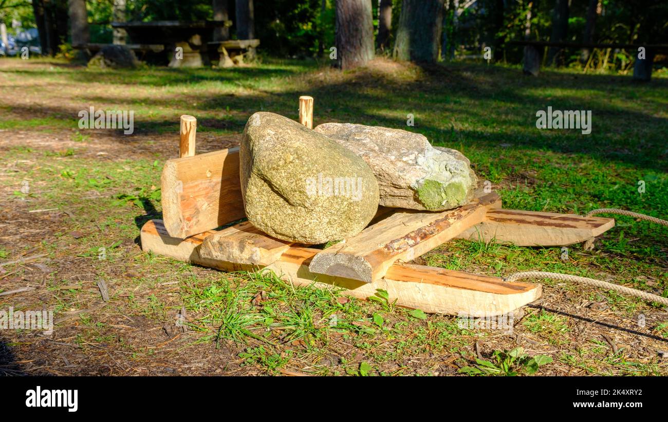 wooden sled with stones. for moving heavy things. Latvian history Stock ...