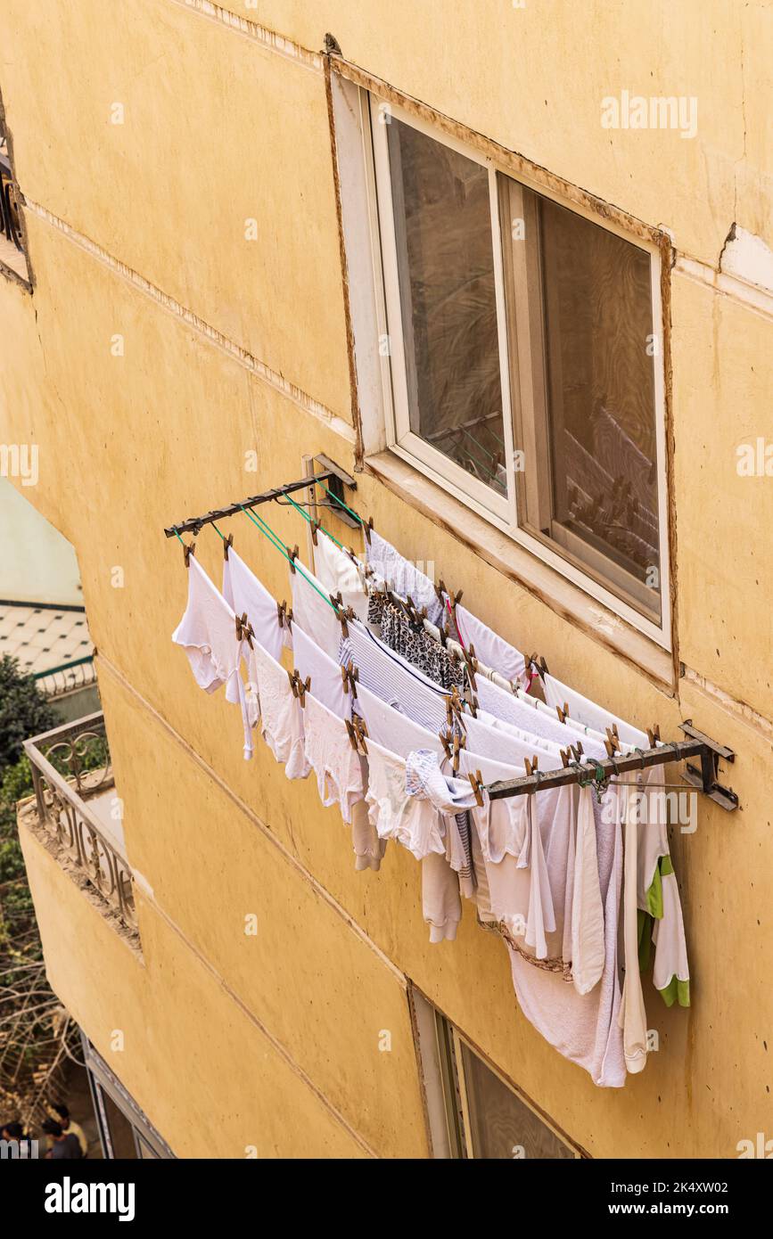 Giza, Cairo, Egypt. Laundry hung to dry outside a window in Giza, Egypt ...