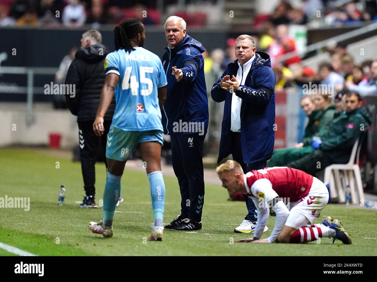 Coventry City manager Mark Robins applauds the foul from Coventry City ...