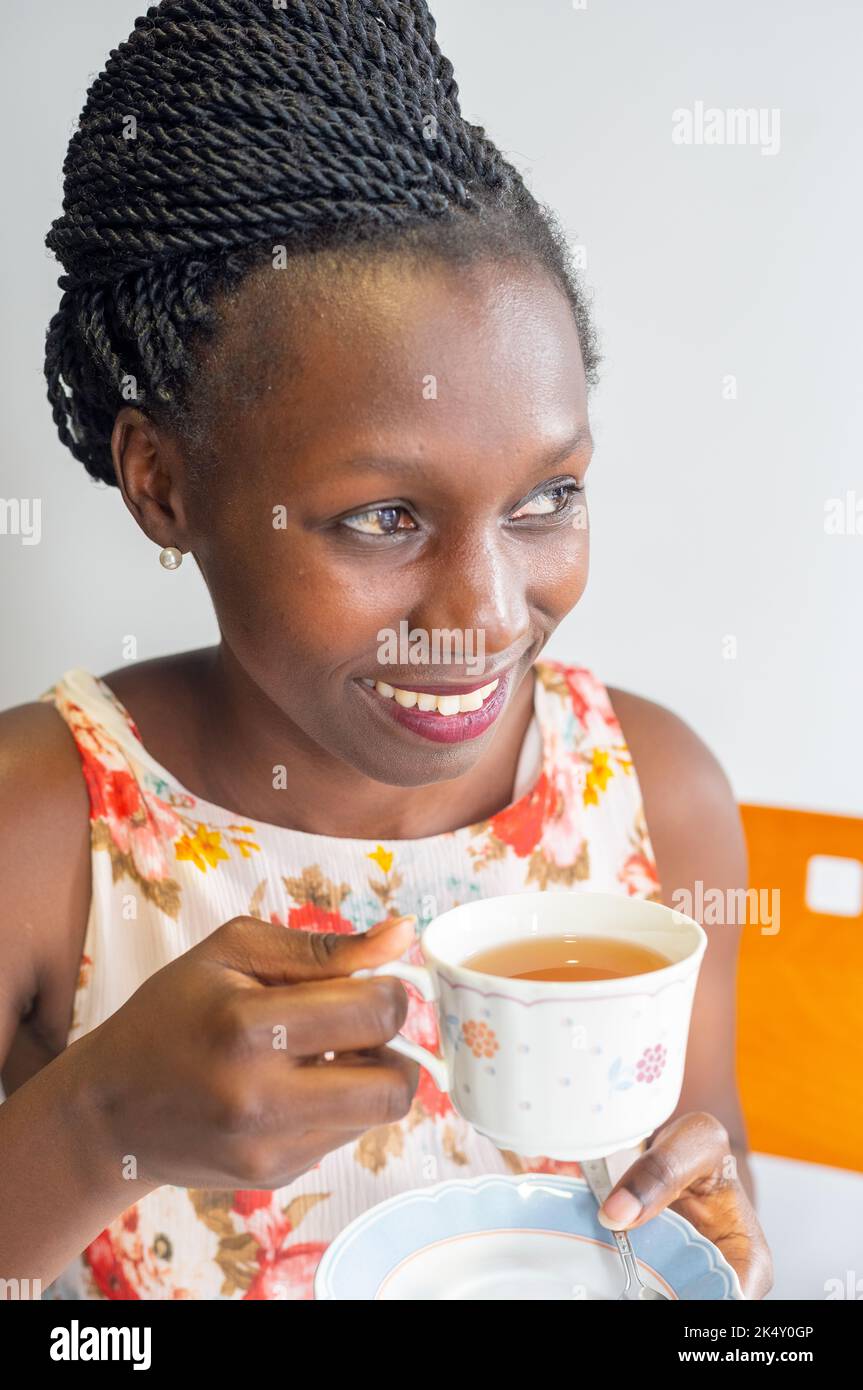 Vintage woman drinking tea hi-res stock photography and images - Alamy