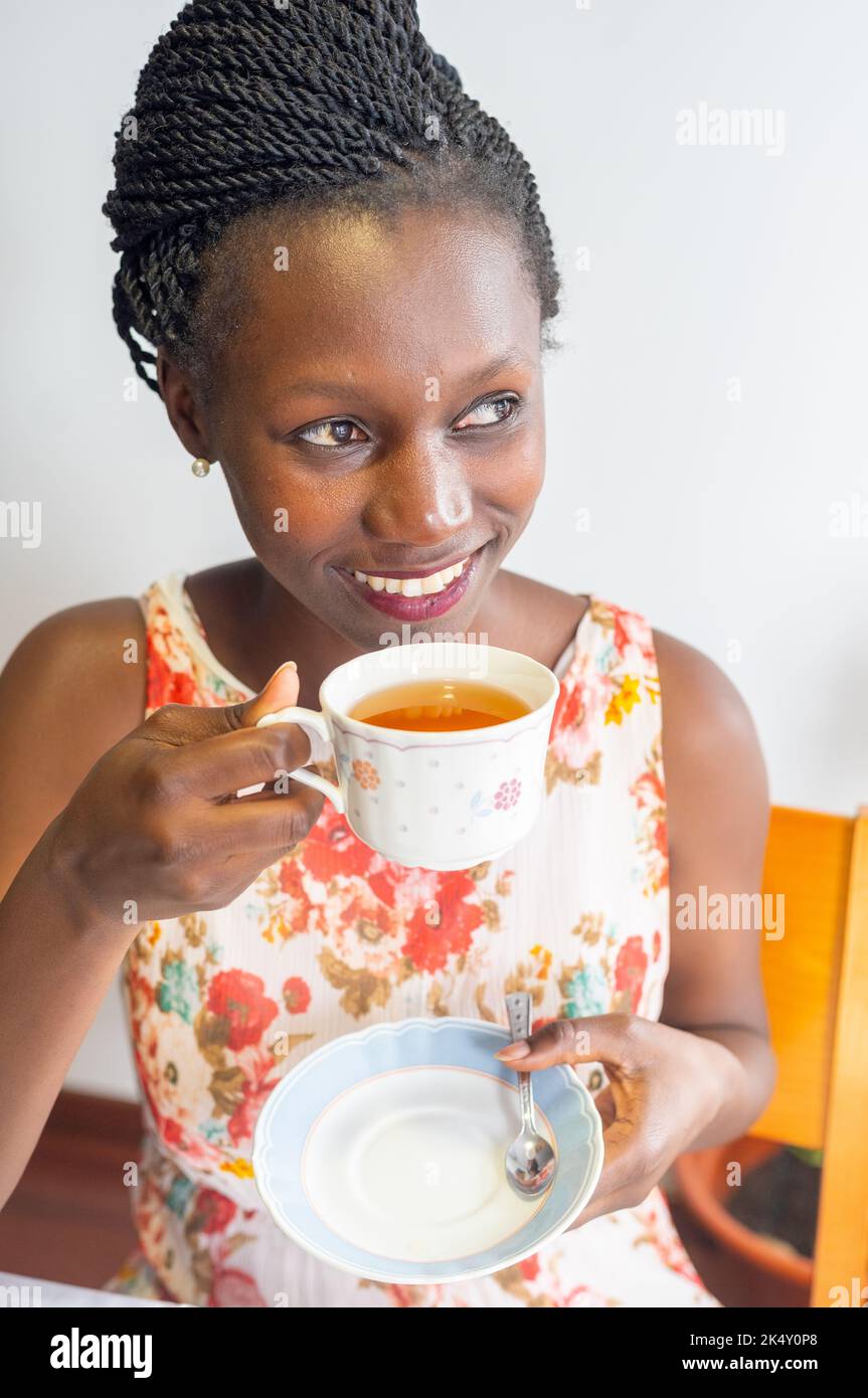 Vintage woman drinking tea hi-res stock photography and images - Alamy