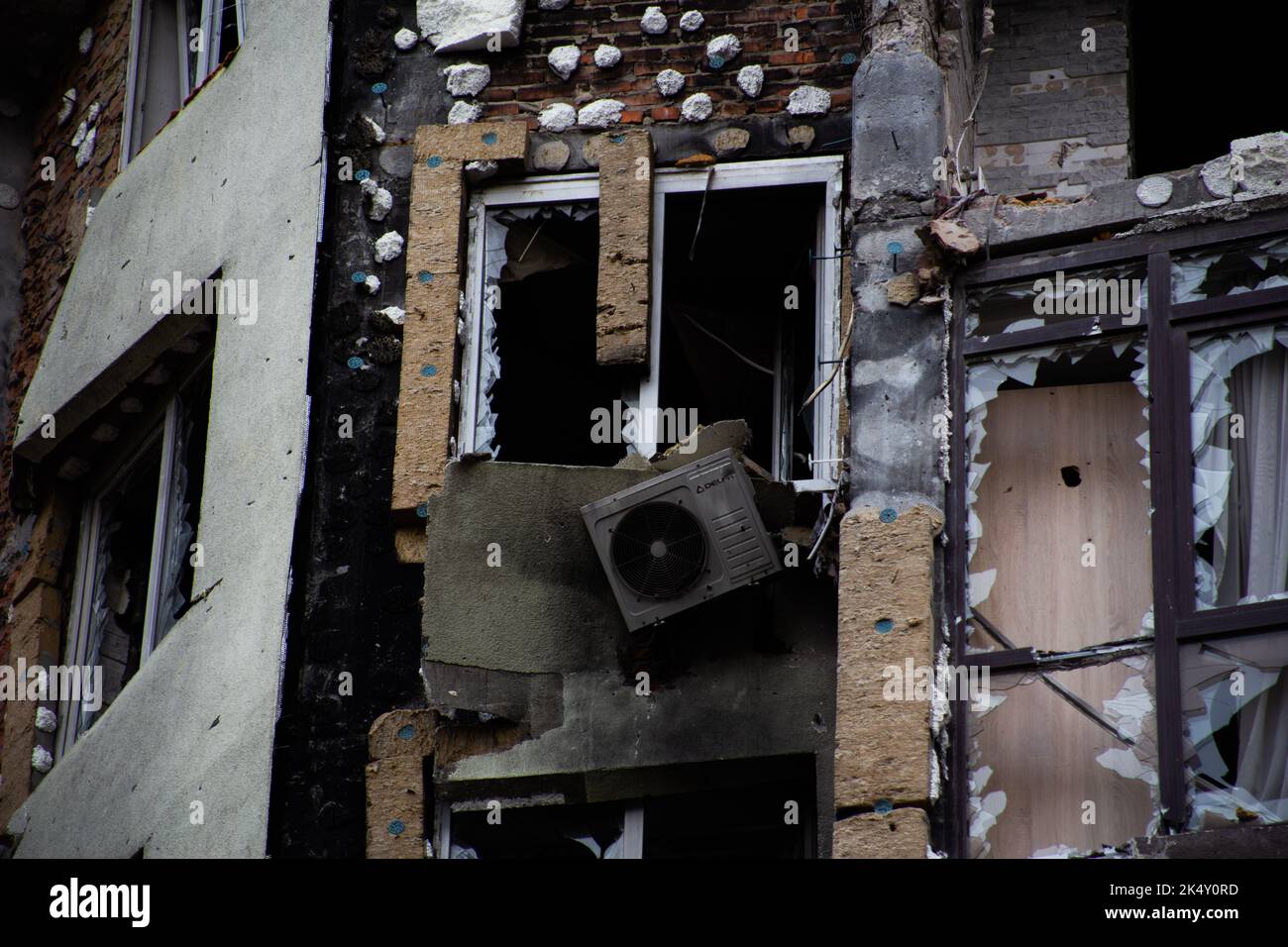 Broken windows in residential buildings in the city of Bucha in the ...