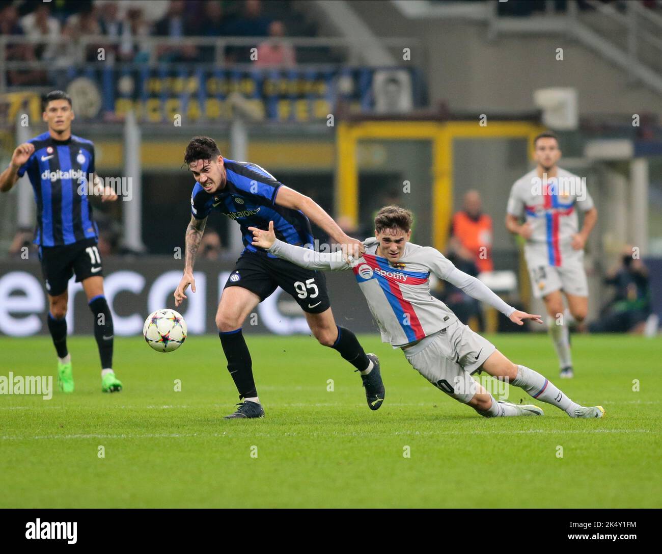Alessandro Bastoni of Fc Inter and Gavi of Fc Barcelona during the UEFA Champions League match ...