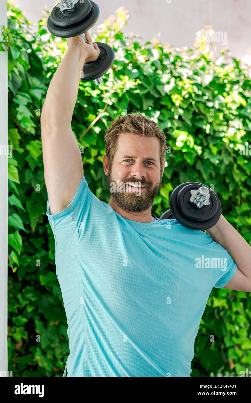 Muscle man advert hi-res stock photography and images - Alamy