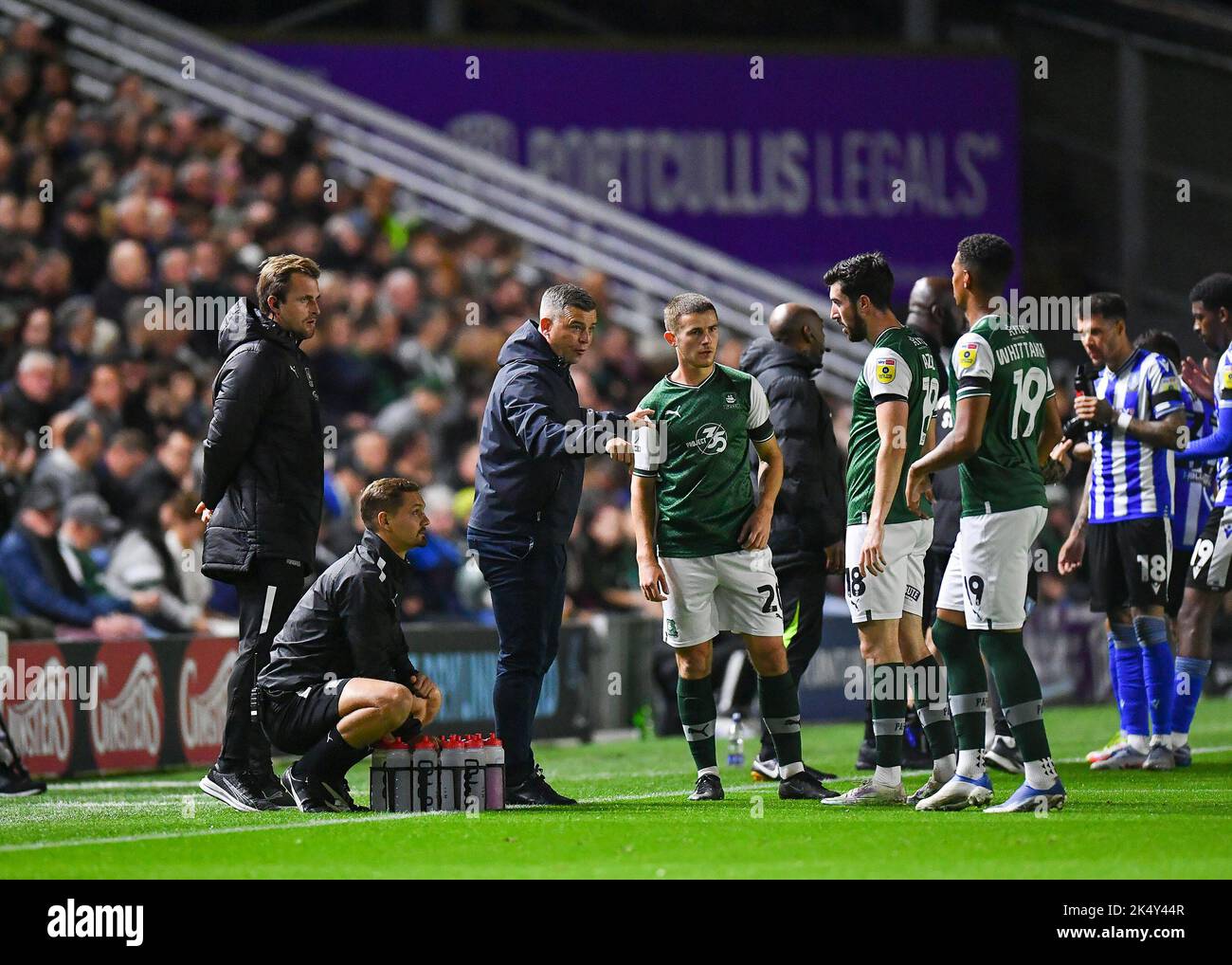 Plymouth Argyle Manager Steven Schumacher talks to hi players during ...