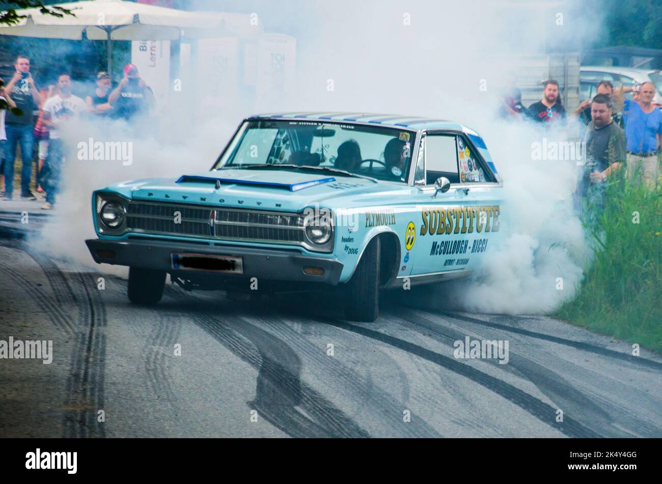 A vintage blue Plymouth car at Doc Stinger's Mopar Garage's drag racing ...