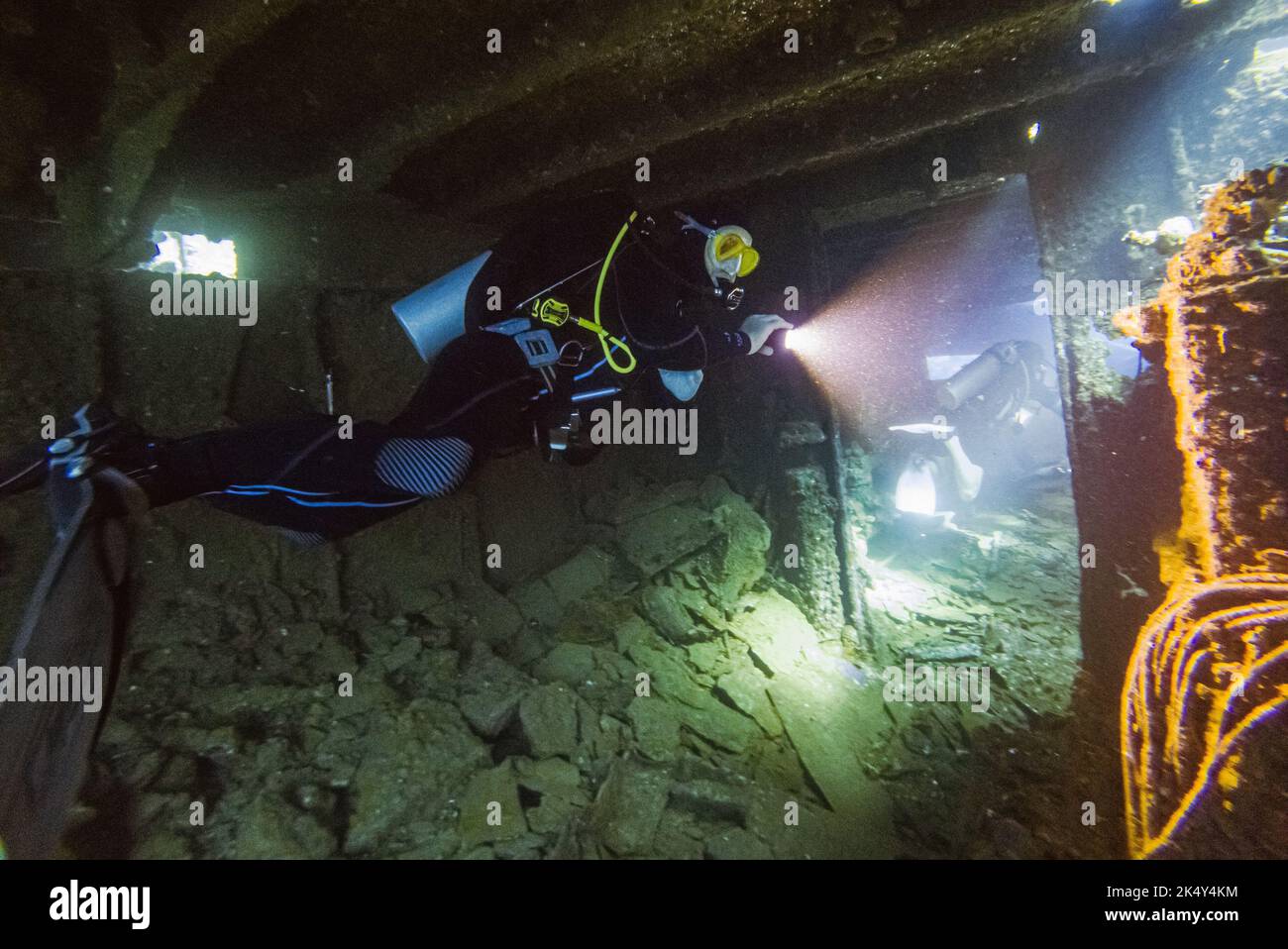 Scuba diver exploring the interior of a shipwreck Chrisoula K on ...