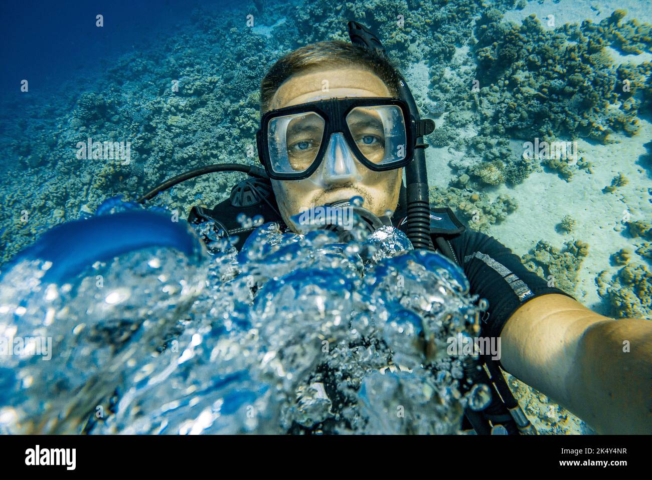 Scuba diver exploring the Gota Abu Ramada reef on September 30, 2022 in ...