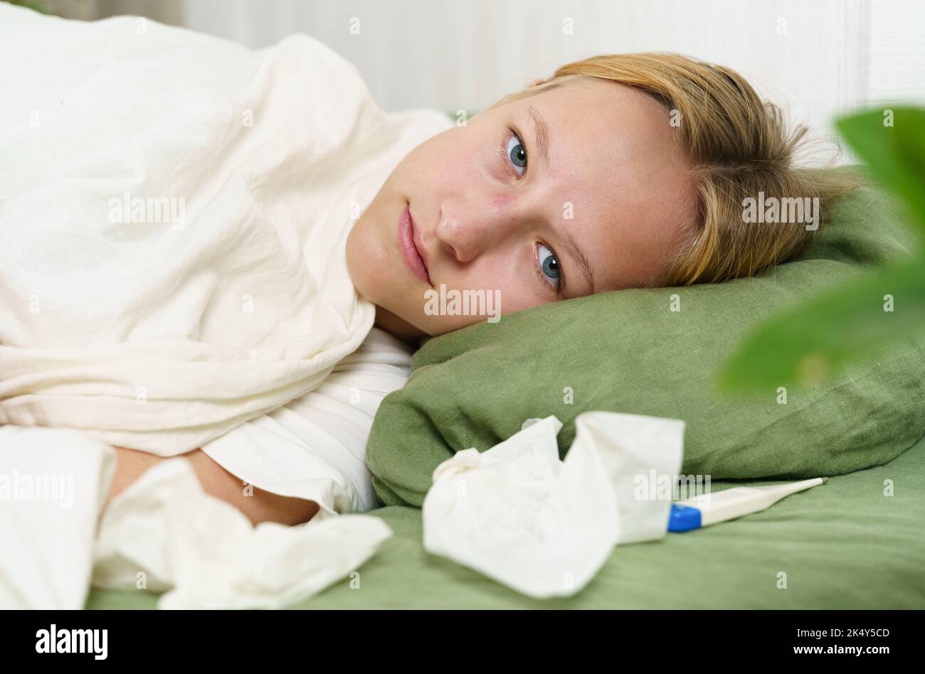 Sick teen girl in bed hi-res stock photography and images - Alamy