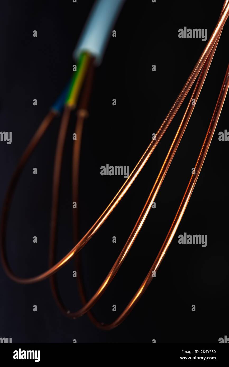 Copper electrical cable wire on black background Stock Photo - Alamy