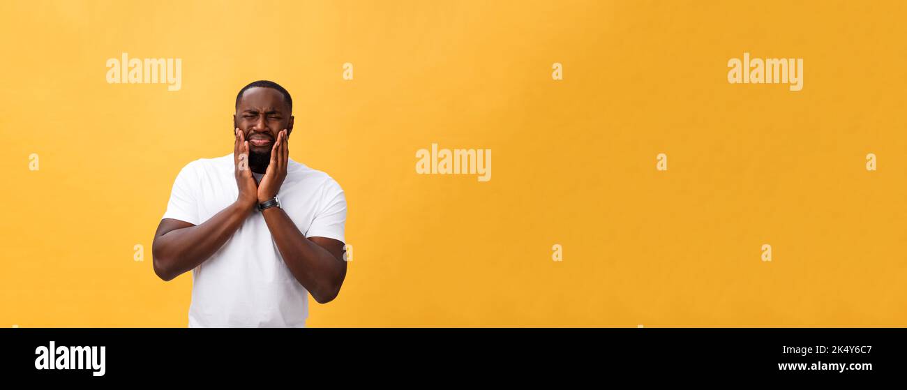 Young Stressed man with hand on his face showing sadness and despair ...