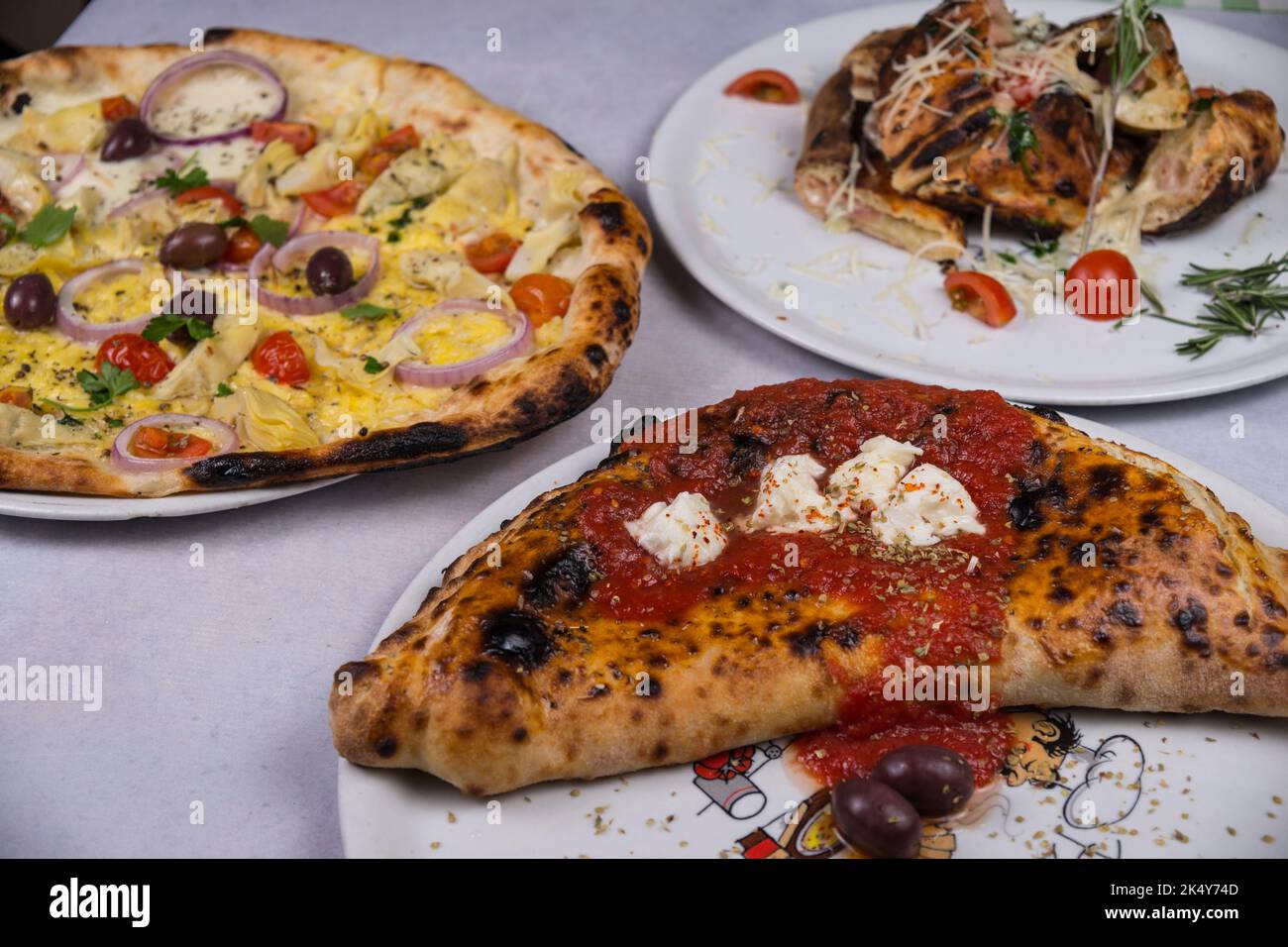 Three different dishes for lunch Stock Photo - Alamy