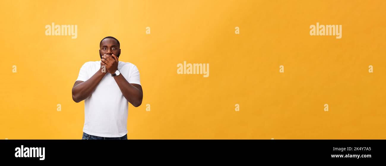 Amazed young African American hipster wearing white t-shirt holding ...