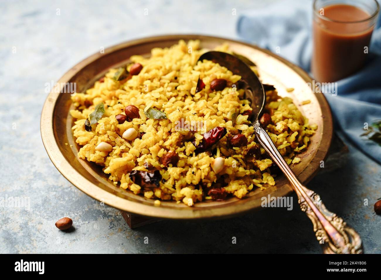 Tamarind Poha or Puli Aval- Indian breakfast with flattened rice Stock ...