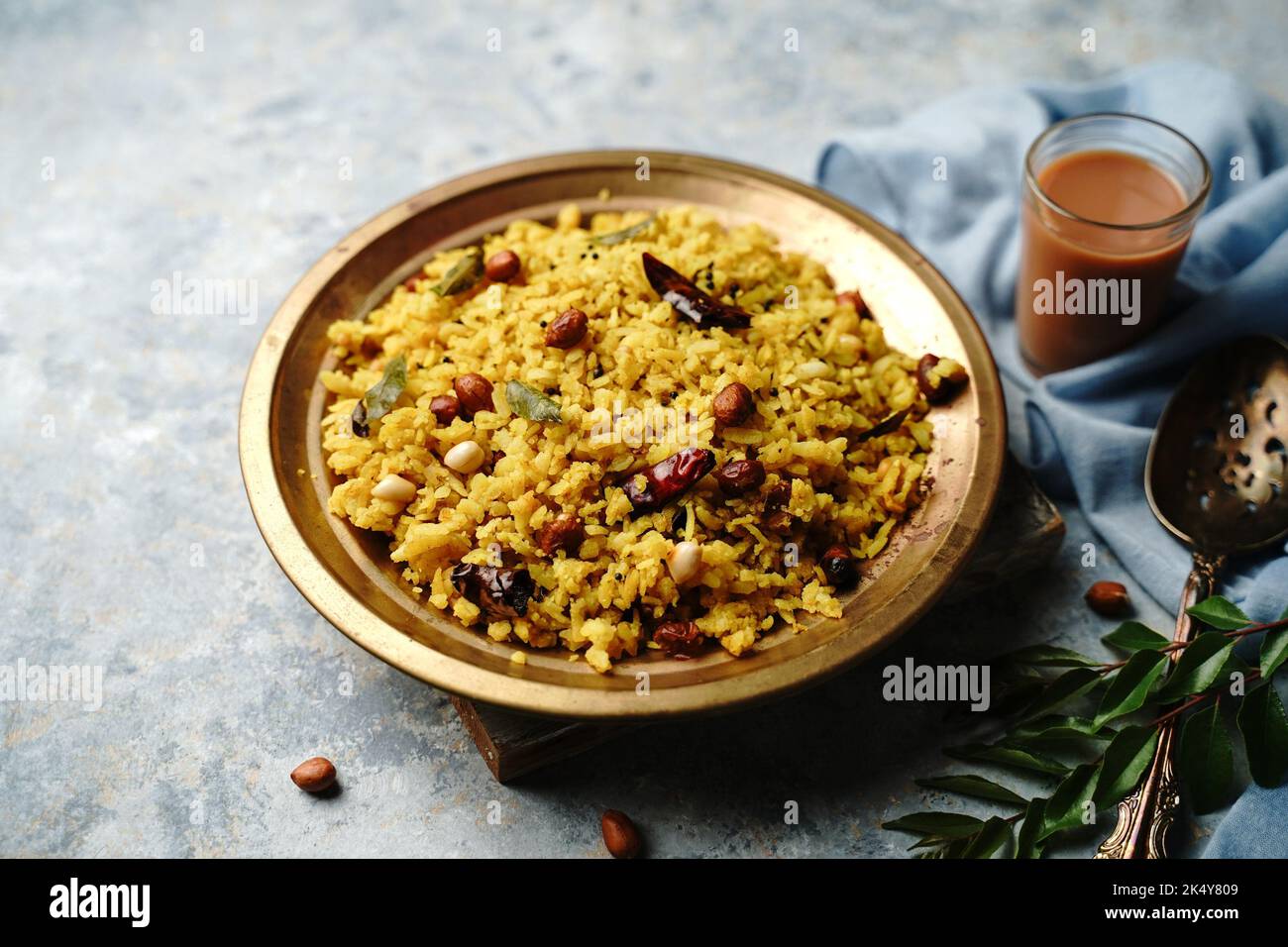 Tamarind Poha or Puli Aval- Indian breakfast with flattened rice Stock ...