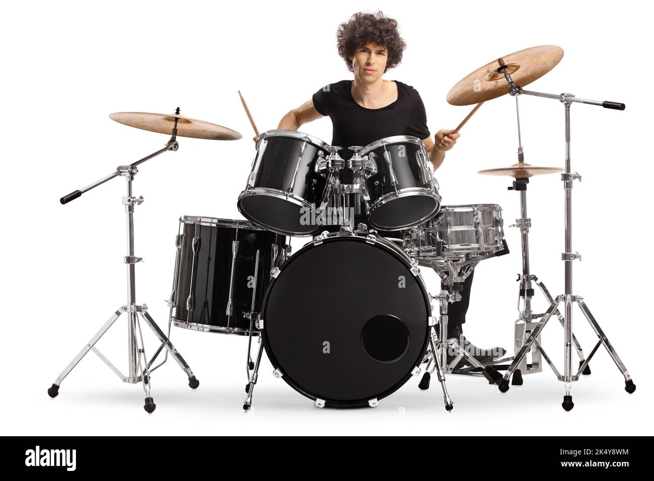 Handsome guy playing drums isolated on white background Stock Photo - Alamy