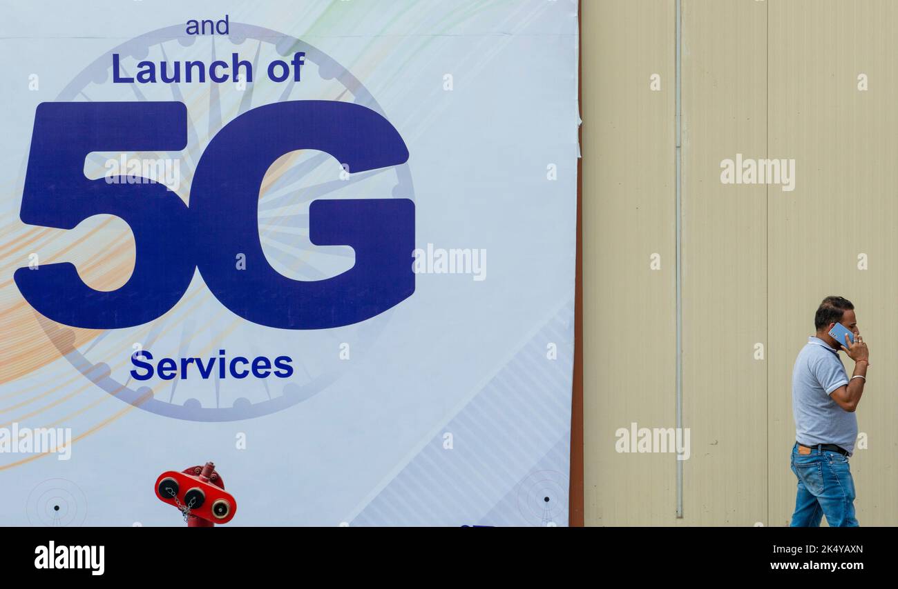 New Delhi, India. 04th Oct, 2022. A man talks on a mobile phone close ...