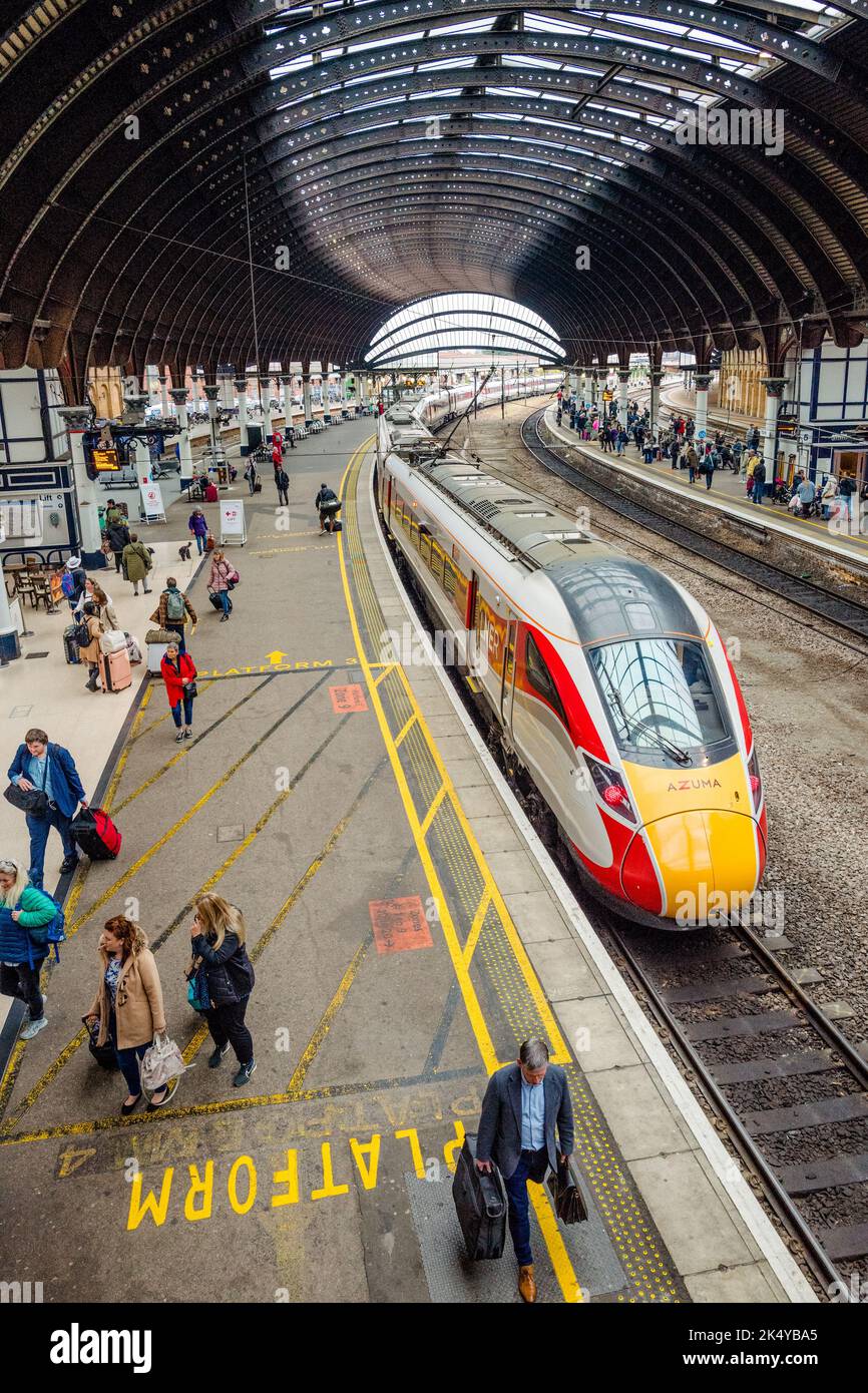 Passengers waiting on York railway station platform for the Azuma ...