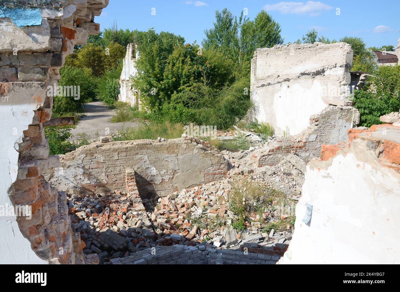 Collapsed industrial multistorey building in daytime. Disaster scene ...