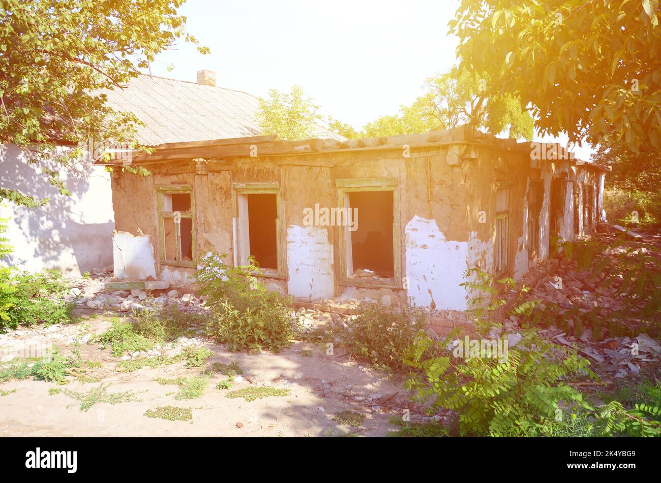 Collapsed industrial building in daytime. Disaster scene full of debris ...