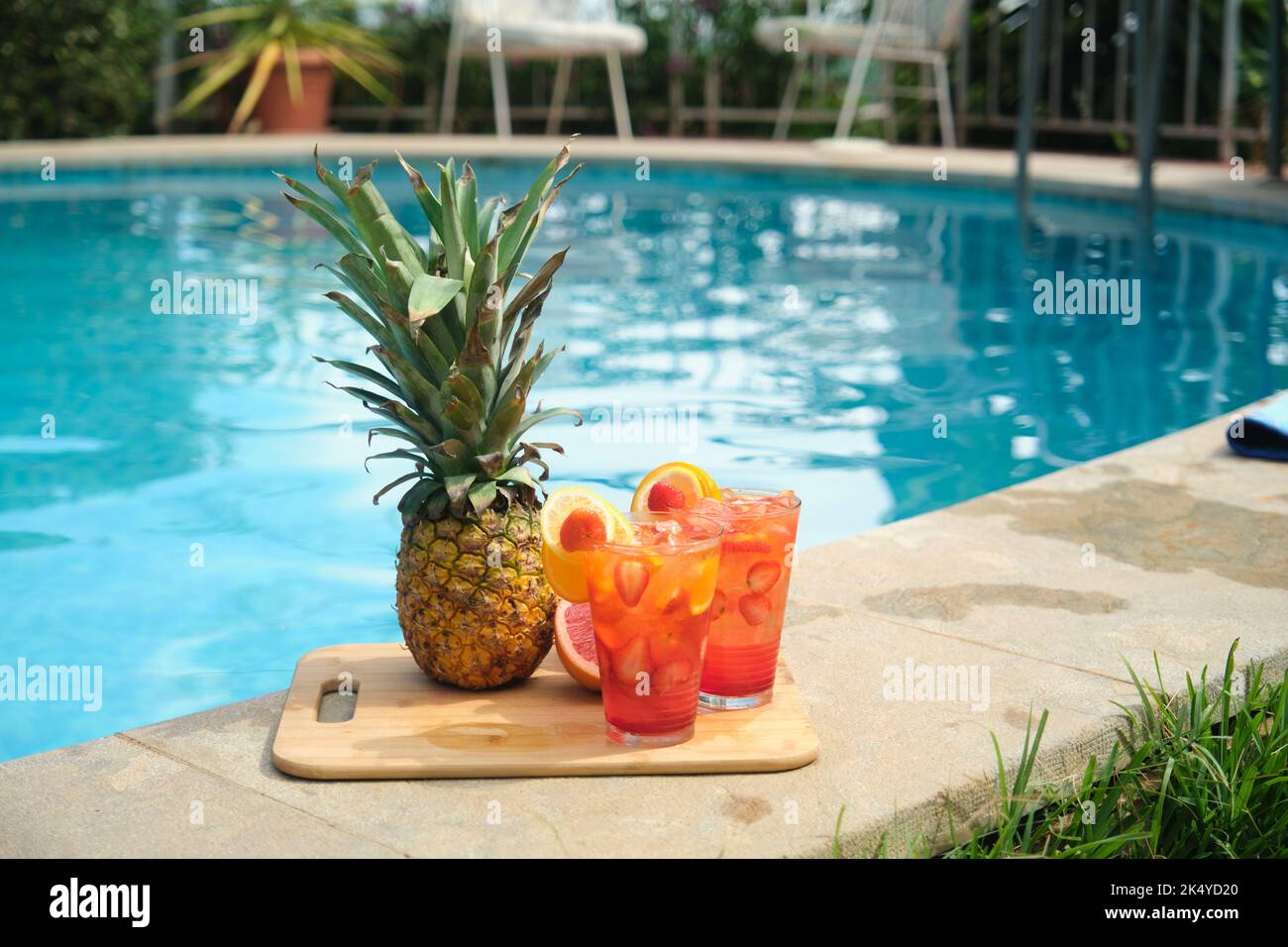 fruit cocktails by the pool Stock Photo - Alamy