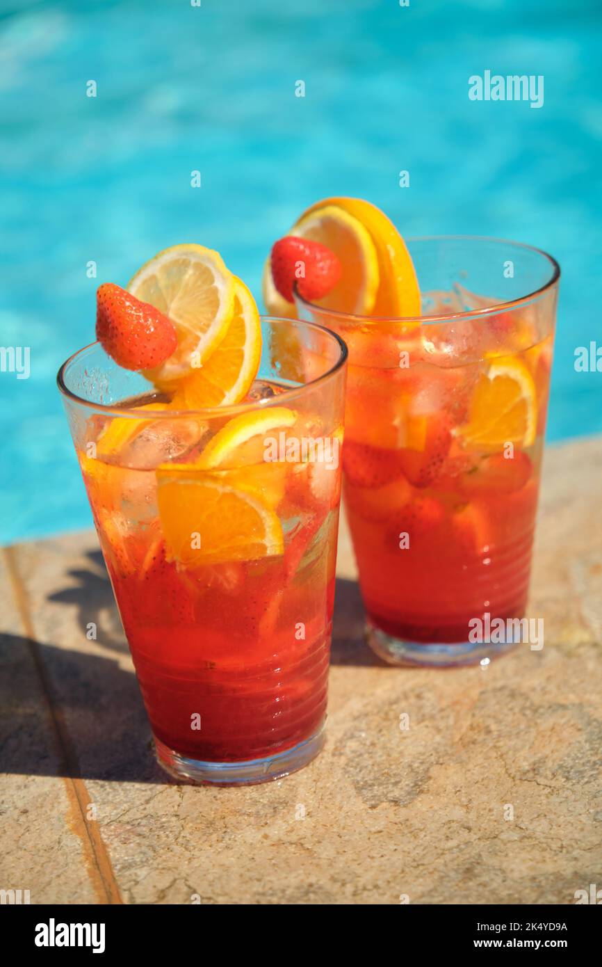 fruit cocktails by the pool Stock Photo - Alamy