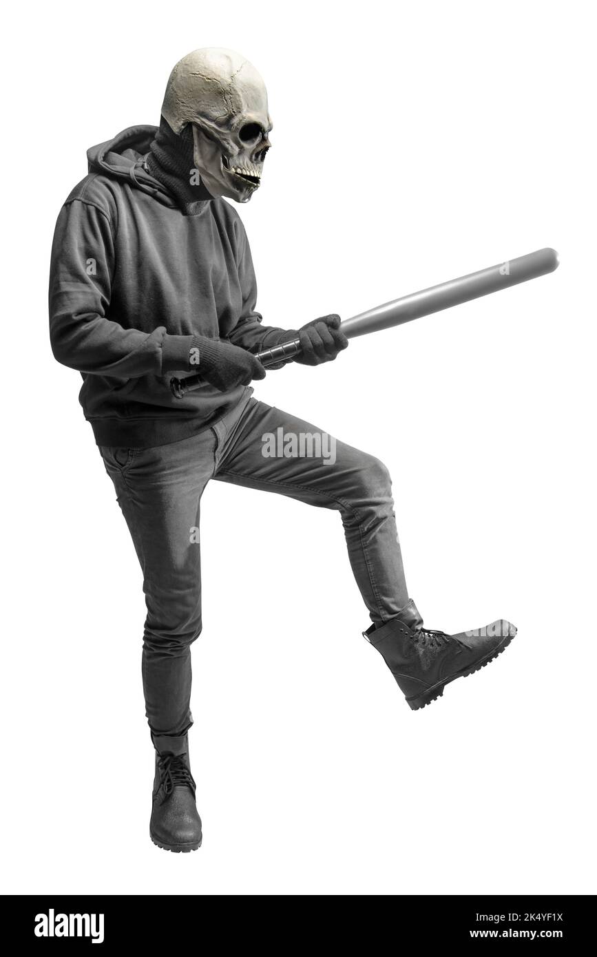 Man with a skull head costume for Halloween holding baseball bat ...