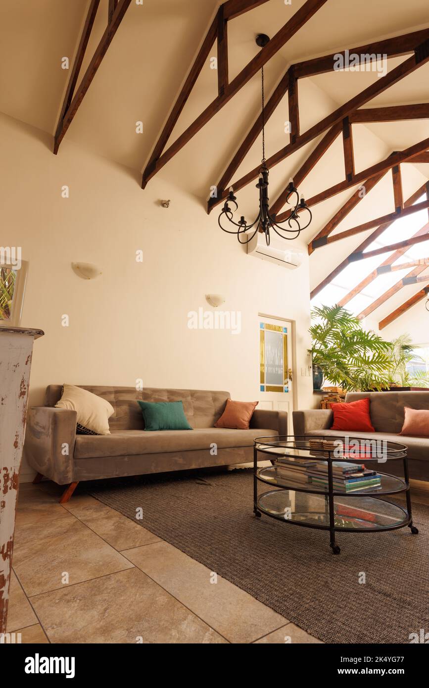 General view of modern living room with sofa and coffee table. House ...