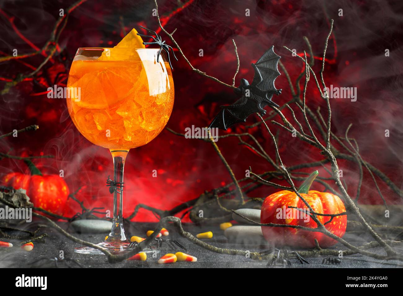 Halloween aperol spritz cocktail on scary dark bloody red background ...