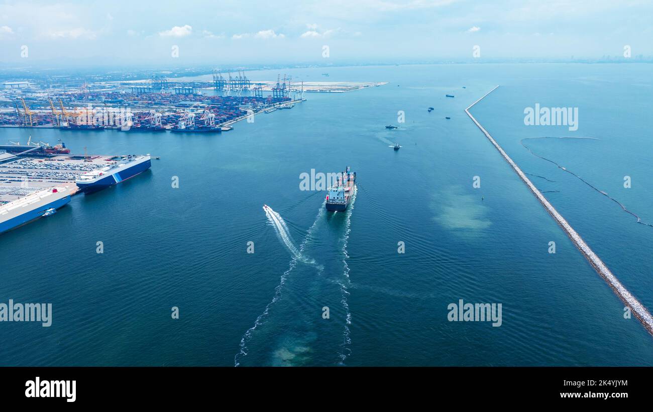 Stern of large cargo ship import export container box on the ocean sea ...