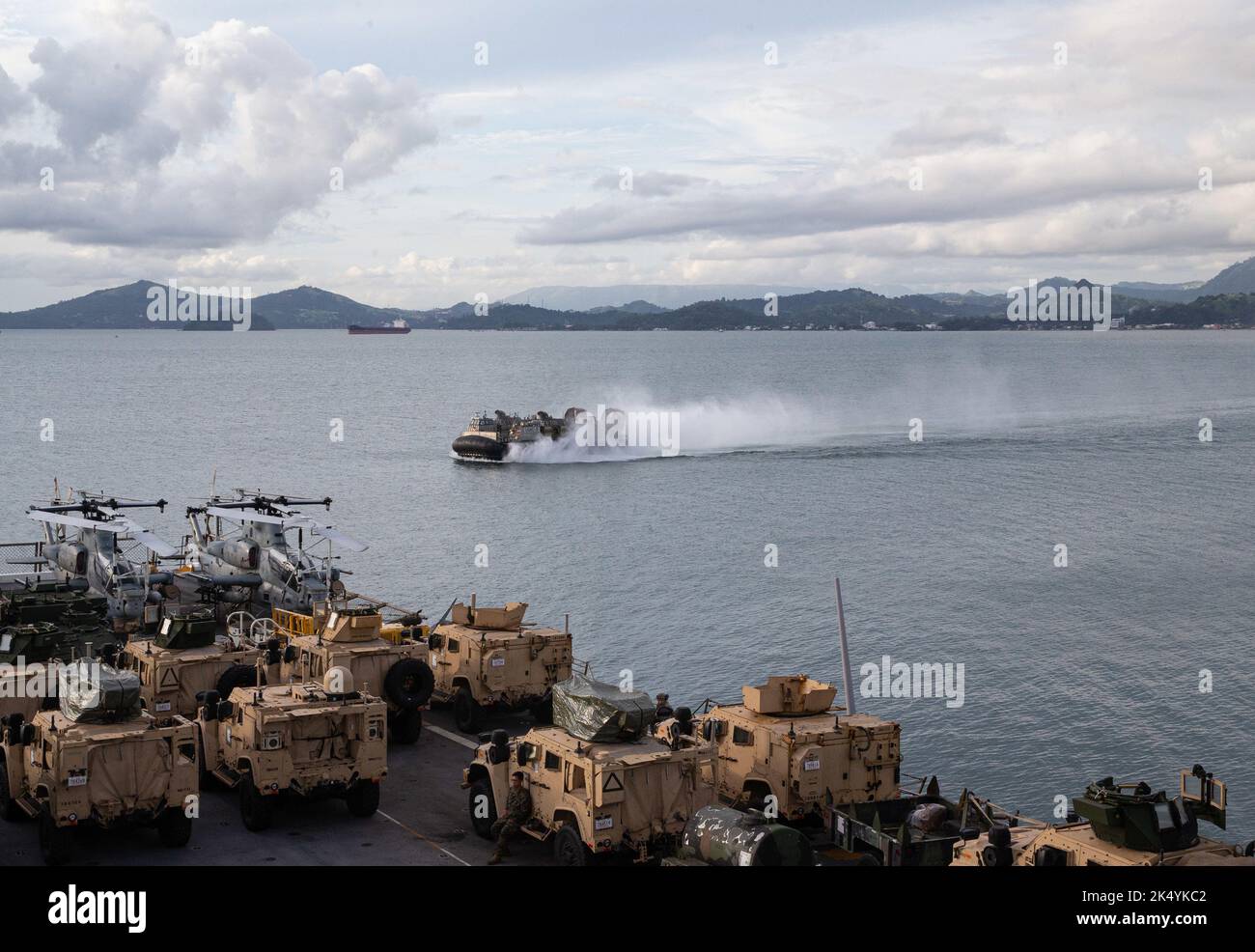A U.S. Navy landing craft, air cushion with Naval Beach Unit Seven ...