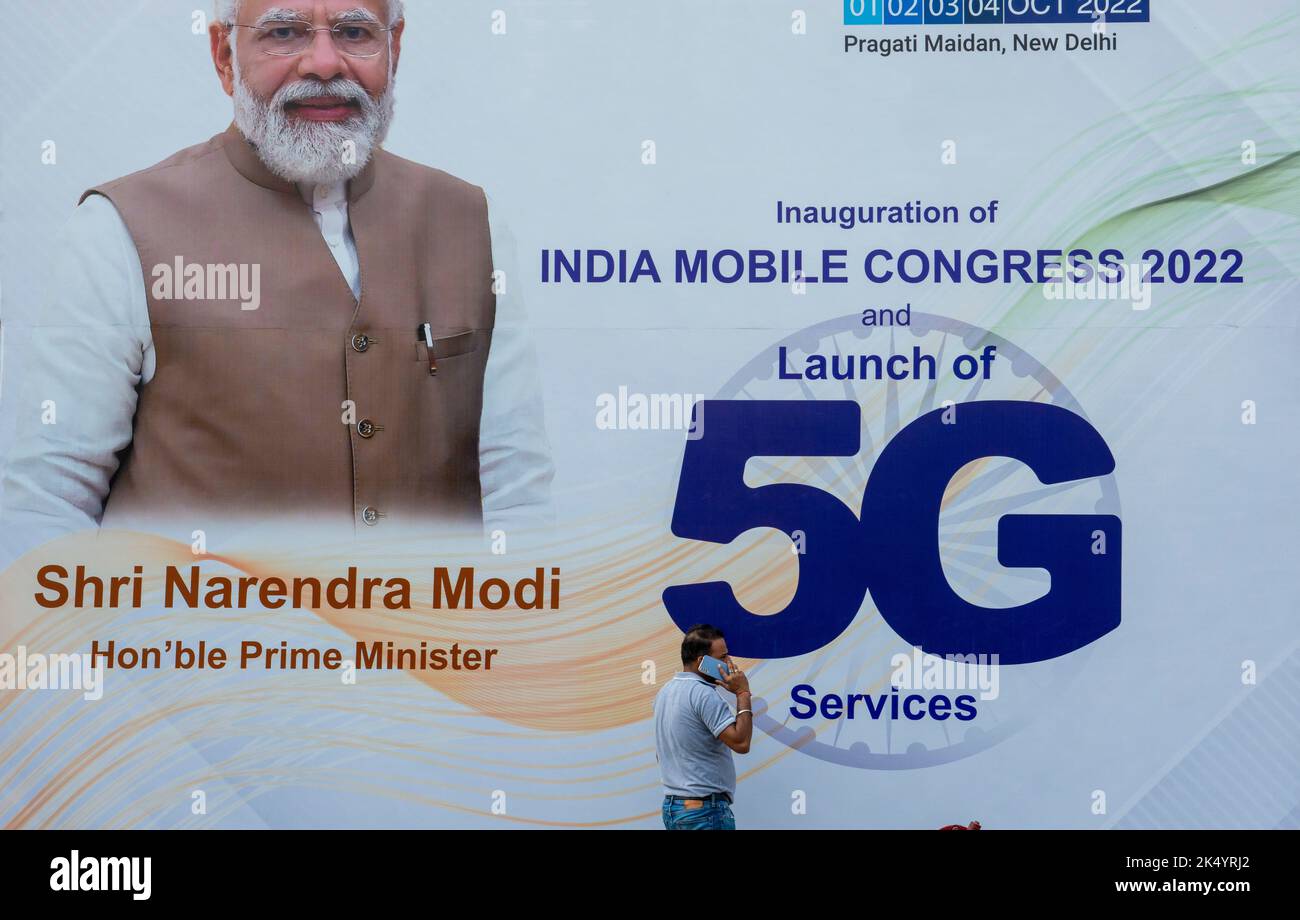 New Delhi, India. 04th Oct, 2022. A man talks on a mobile phone close ...