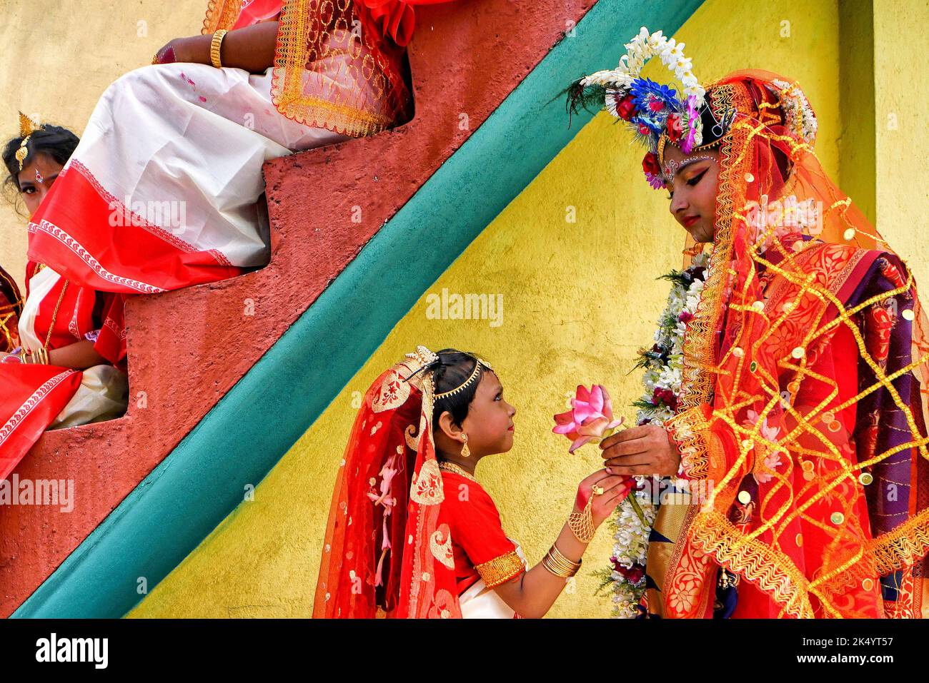 Young girls pose for a photo before participating in the Kumari Puja ...