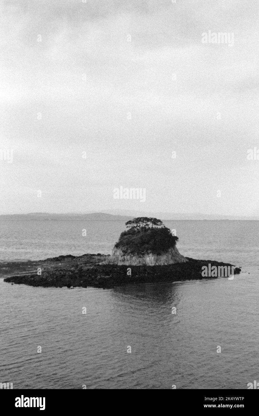 An aerial view of small island surrounded by water in Bay Stock Photo ...