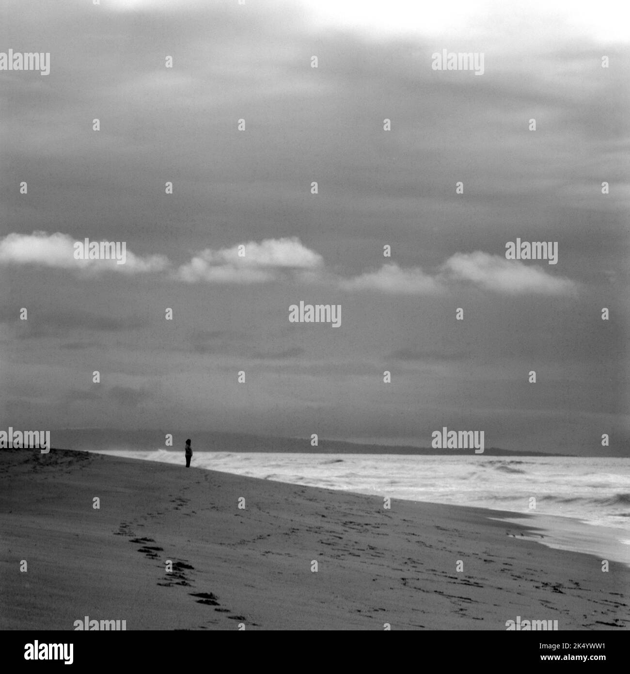 An aerial view of sea waves breaking sandy beach Stock Photo - Alamy