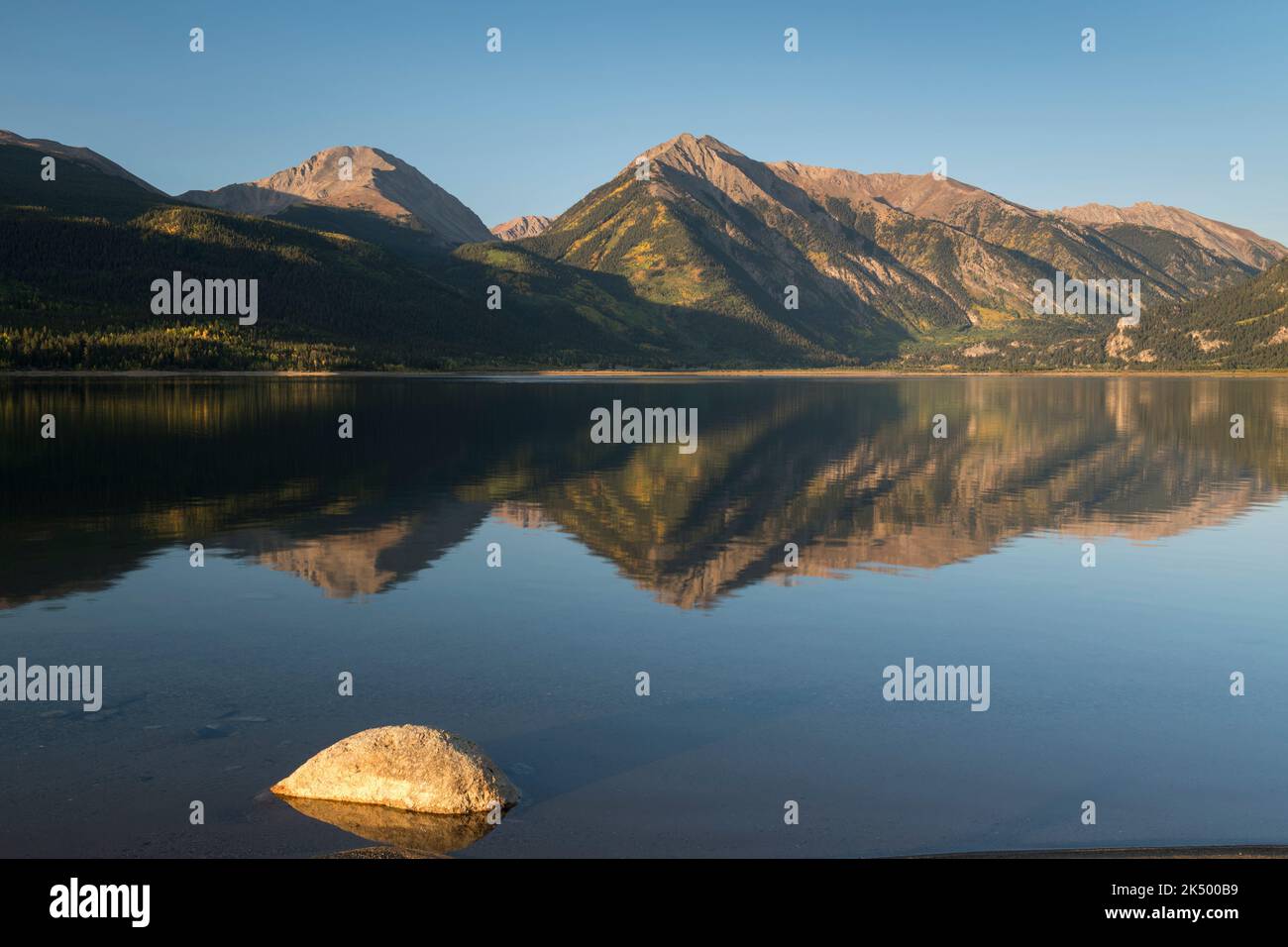 Mount Hope and Twin Peaks rise above the reflection on Twin Lakes in ...