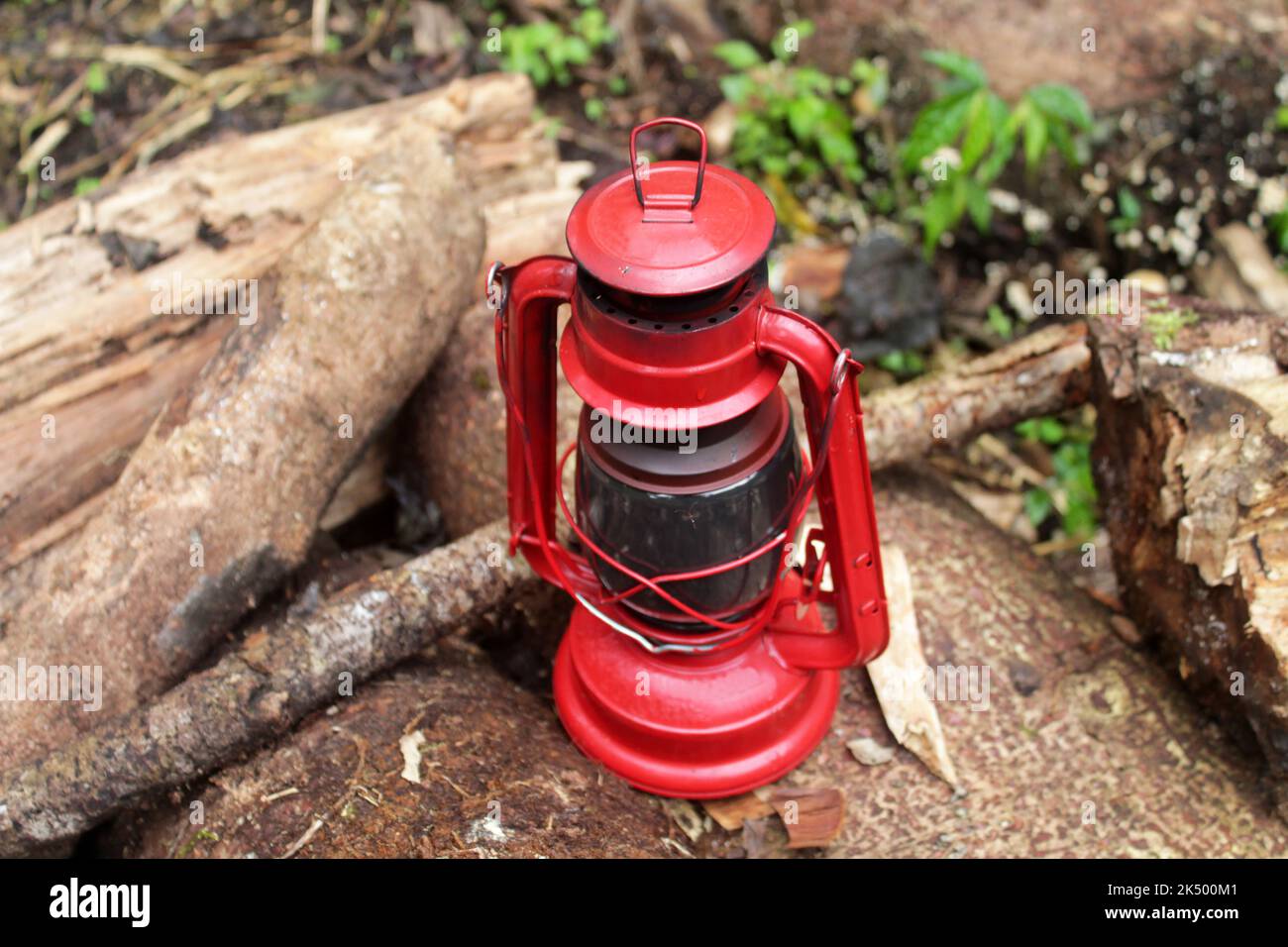 Old classic oil lantern on wood. Lamp equipment for camping adventure ...